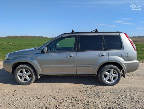 Pelēks Nissan X-Trail 2006 Pasvalys, ar dzinēja tilpumu 2.20 L un nobraukumu 277 tūkst. km par 1300 €, foto 3 vietnē AUTOMOTO.COM.LV