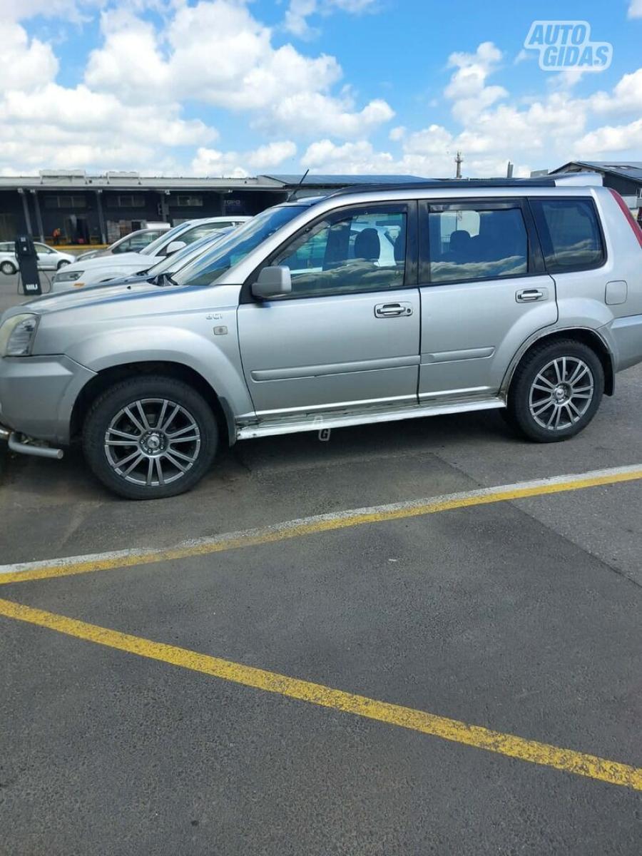 Grey Nissan X-Trail 2006 in Kaunas, with an engine capacity of 2.20 L and mileage of 300 thousand km for 850 €, photo 5 on AUTOMOTO.COM.LV