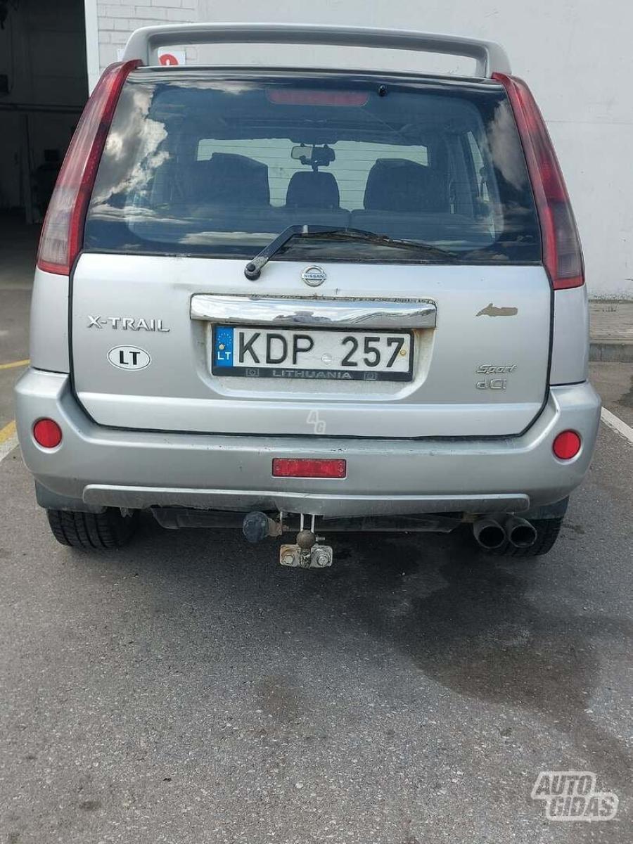 Grey Nissan X-Trail 2006 in Kaunas, with an engine capacity of 2.20 L and mileage of 300 thousand km for 850 €, photo 13 on AUTOMOTO.COM.LV