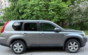 Pelēks Nissan X-Trail 2007 Rīga, ar dzinēja tilpumu 2.00 L un nobraukumu 290 tūkst. km par 2800 €, foto  vietnē AUTOMOTO.COM.LV
