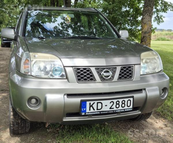 Grey Nissan X-Trail 2007 in Saldus, with an engine capacity of 2.20 L and mileage of 290 thousand km for 3100 €, photo 4 on AUTOMOTO.COM.LV