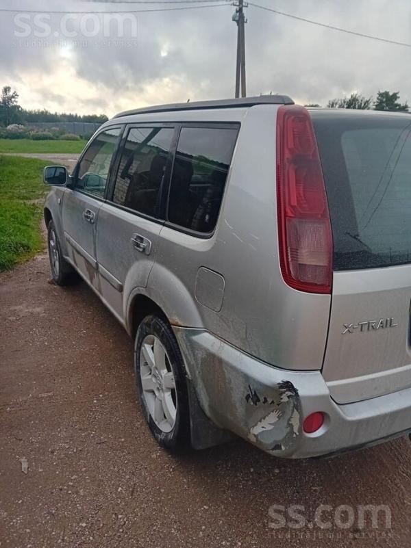Pelēks Nissan X-Trail 2007 Saldus, ar dzinēja tilpumu 2.00 L un nobraukumu 580 tūkst. km par 1400 €, foto 5 vietnē AUTOMOTO.COM.LV