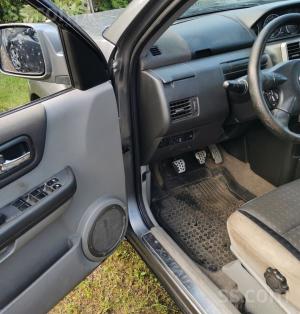 Pelēks Nissan X-Trail 2007 Tukums, ar dzinēja tilpumu 2.20 L un nobraukumu 306 tūkst. km par 2650 €, foto 6 vietnē AUTOMOTO.COM.LV