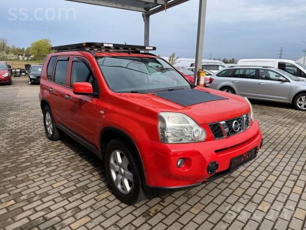 Red Nissan X-Trail 2010 in Talsi, with an engine capacity of 2.00 L and mileage of 237 thousand km for 8470 €, photo 3 on AUTOMOTO.COM.LV