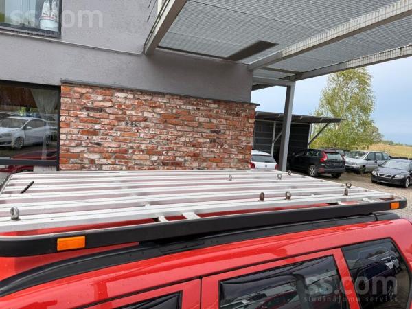 Red Nissan X-Trail 2010 in Talsi, with an engine capacity of 2.00 L and mileage of 237 thousand km for 8470 €, photo 9 on AUTOMOTO.COM.LV