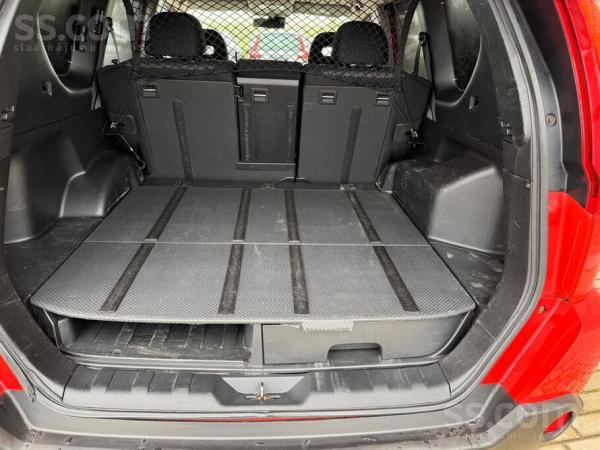 Red Nissan X-Trail 2010 in Talsi, with an engine capacity of 2.00 L and mileage of 237 thousand km for 8470 €, photo 8 on AUTOMOTO.COM.LV