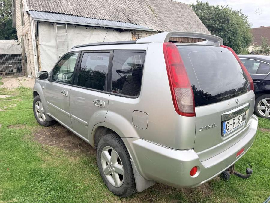 Yellow Nissan X-Trail 2005 in Taurage, with an engine capacity of 2.18 L and mileage of 260 thousand km for 2000 €, photo 5 on AUTOMOTO.COM.LV