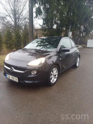 Black Opel Adam 2013 in Riga, with an engine capacity of 1.20 L and mileage of 240 thousand km for 2995 €, photo  on AUTOMOTO.COM.LV