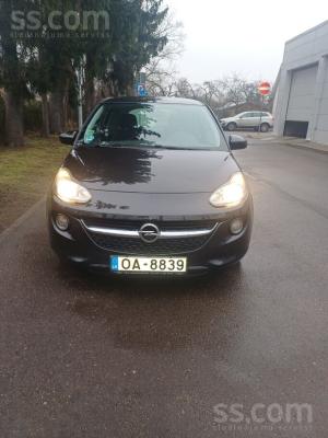 Black Opel Adam 2013 in Riga, with an engine capacity of 1.20 L and mileage of 240 thousand km for 2995 €, photo 2 on AUTOMOTO.COM.LV