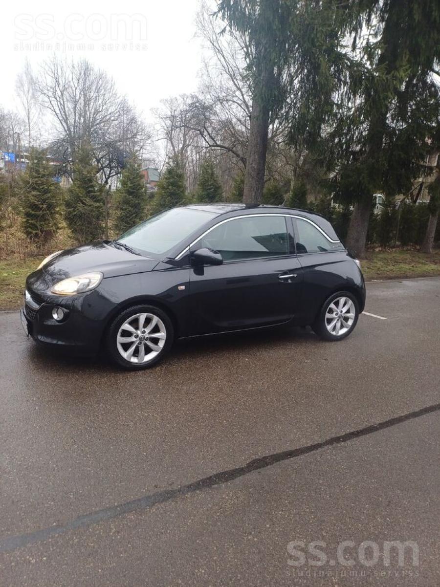 Black Opel Adam 2013 in Riga, with an engine capacity of 1.20 L and mileage of 240 thousand km for 2995 €, photo 3 on AUTOMOTO.COM.LV