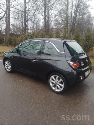 Black Opel Adam 2013 in Riga, with an engine capacity of 1.20 L and mileage of 240 thousand km for 2995 €, photo 4 on AUTOMOTO.COM.LV