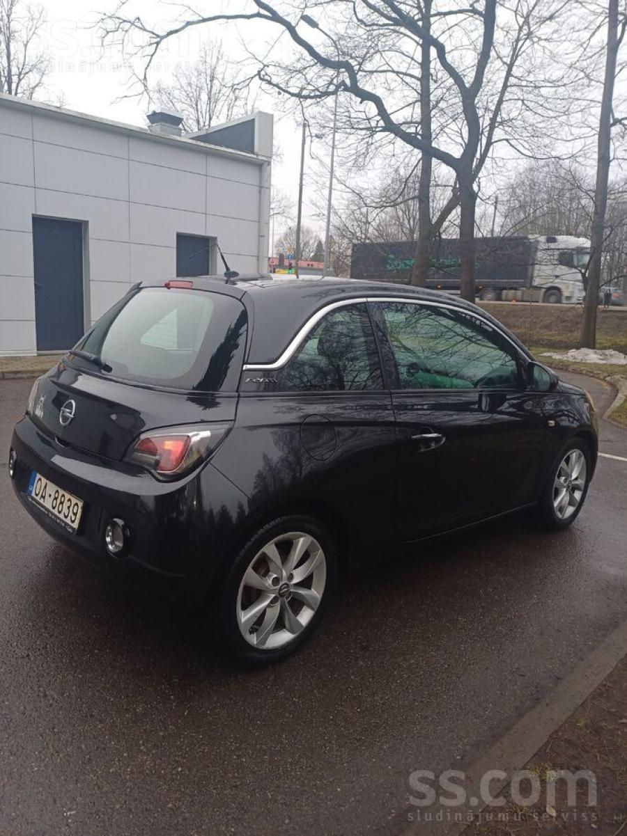 Black Opel Adam 2013 in Riga, with an engine capacity of 1.20 L and mileage of 240 thousand km for 2995 €, photo 6 on AUTOMOTO.COM.LV