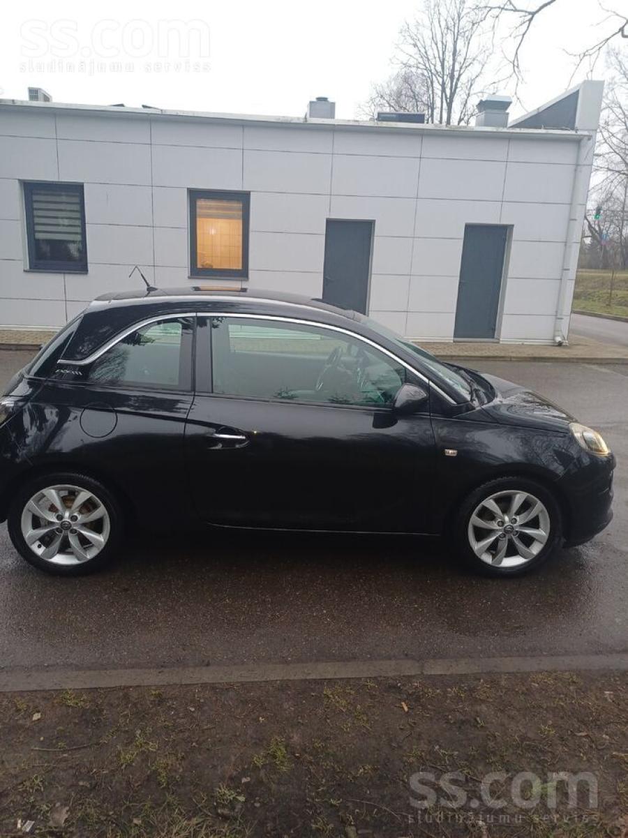 Black Opel Adam 2013 in Riga, with an engine capacity of 1.20 L and mileage of 240 thousand km for 2995 €, photo 7 on AUTOMOTO.COM.LV