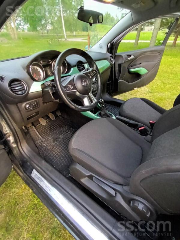 Black Opel Adam 2013 in Riga, with an engine capacity of 1.20 L and mileage of 242 thousand km for 2950 €, photo 4 on AUTOMOTO.COM.LV