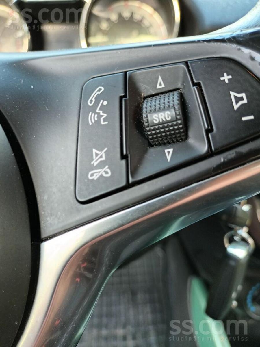 Black Opel Adam 2013 in Riga, with an engine capacity of 1.20 L and mileage of 242 thousand km for 2950 €, photo 11 on AUTOMOTO.COM.LV