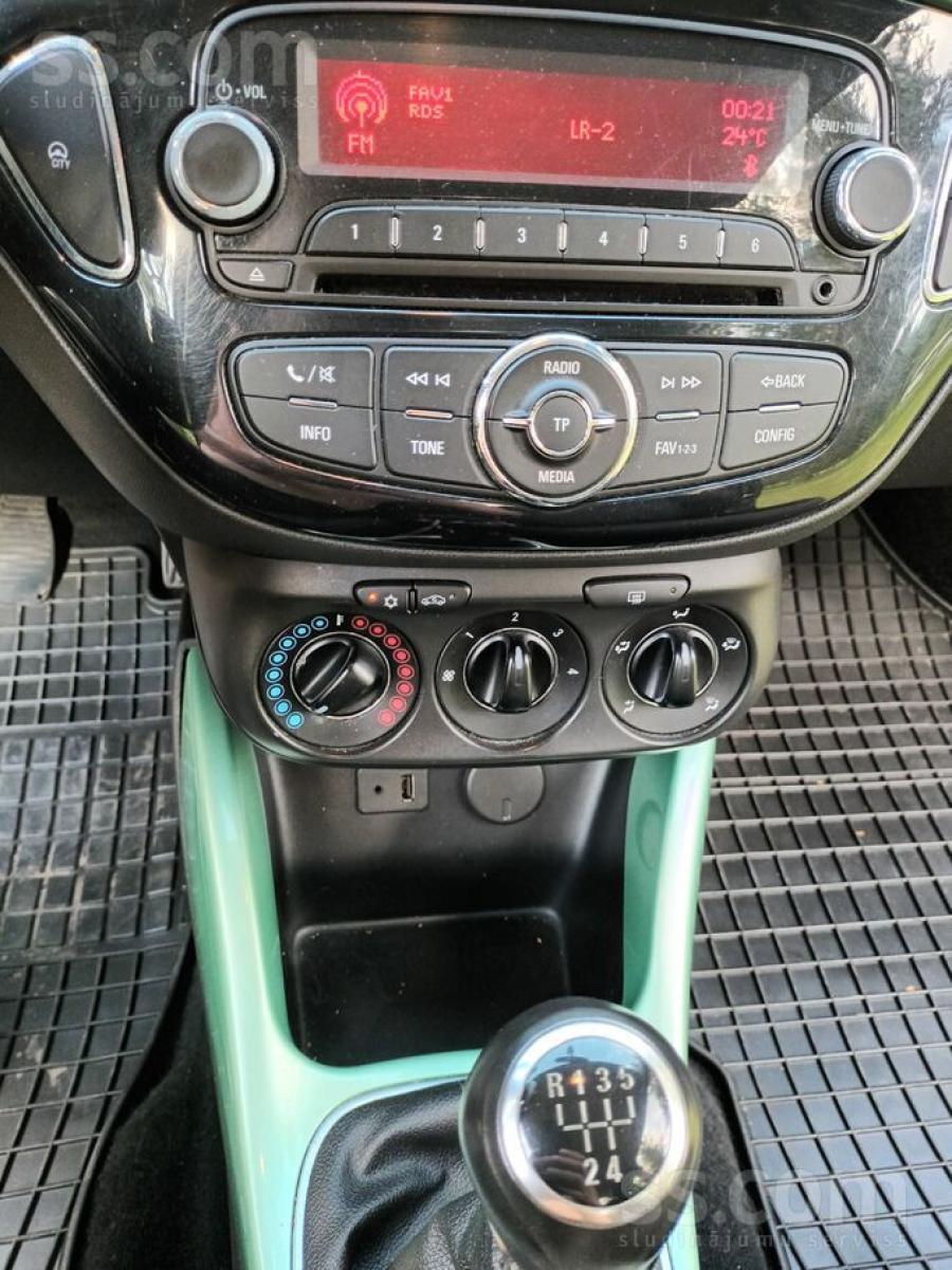 Black Opel Adam 2013 in Riga, with an engine capacity of 1.20 L and mileage of 242 thousand km for 2950 €, photo 12 on AUTOMOTO.COM.LV