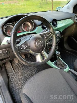 Black Opel Adam 2013 in Riga, with an engine capacity of 1.20 L and mileage of 242 thousand km for 2950 €, photo 13 on AUTOMOTO.COM.LV