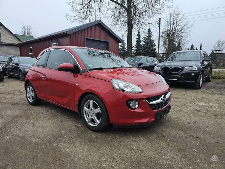 Red Opel Adam 2013 in Ukmerge, with an engine capacity of 1.23 L and mileage of 71 thousand km for 3500 €, photo 1 on AUTOMOTO.COM.LV