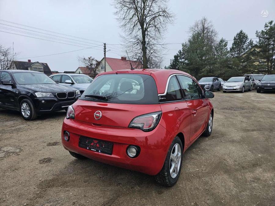 Red Opel Adam 2013 in Ukmerge, with an engine capacity of 1.23 L and mileage of 71 thousand km for 3500 €, photo 3 on AUTOMOTO.COM.LV