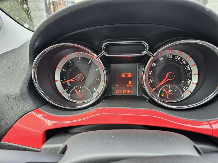Red Opel Adam 2013 in Ukmerge, with an engine capacity of 1.23 L and mileage of 71 thousand km for 3500 €, photo 15 on AUTOMOTO.COM.LV