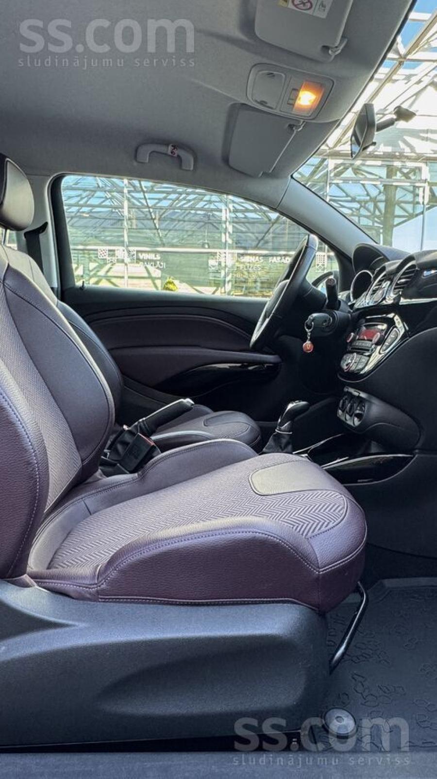 Violet Opel Adam 2016 in Riga, with an engine capacity of 1.40 L and mileage of 83 thousand km for 6700 €, photo 10 on AUTOMOTO.COM.LV