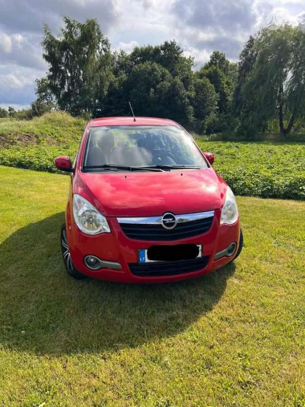 Red Opel Agila 2009 in Taurage, with an engine capacity of 1.23 L and mileage of 136 thousand km for 1100 €, photo 1 on AUTOMOTO.COM.LV
