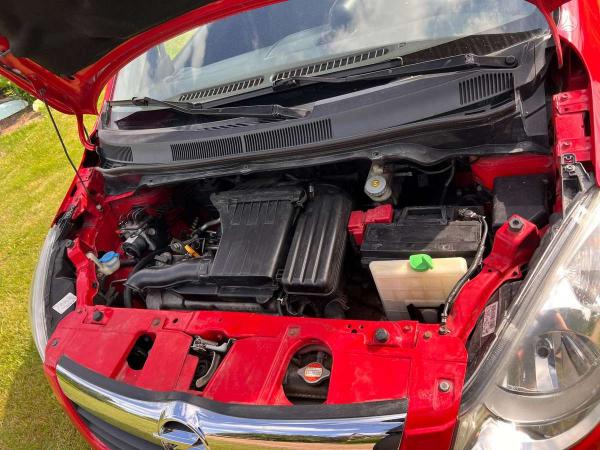 Red Opel Agila 2009 in Taurage, with an engine capacity of 1.23 L and mileage of 136 thousand km for 1100 €, photo 4 on AUTOMOTO.COM.LV