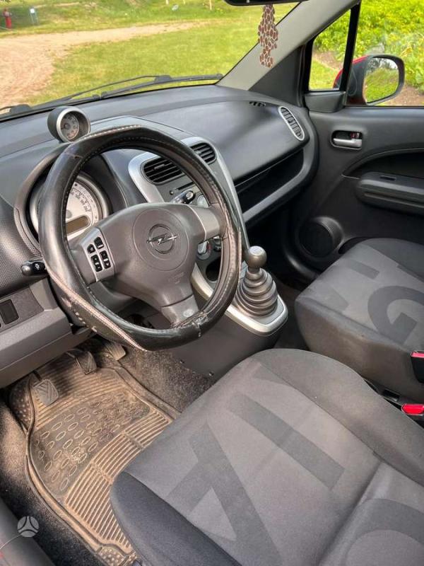 Red Opel Agila 2009 in Taurage, with an engine capacity of 1.23 L and mileage of 136 thousand km for 1100 €, photo 7 on AUTOMOTO.COM.LV