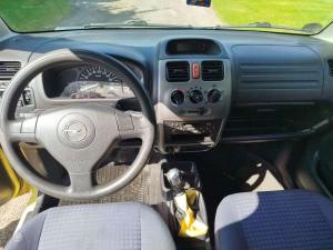 Yellow Opel Agila 2004 in Siauliai, with an engine capacity of 1.25 L and mileage of 312 thousand km for 1500 €, photo 10 on AUTOMOTO.COM.LV