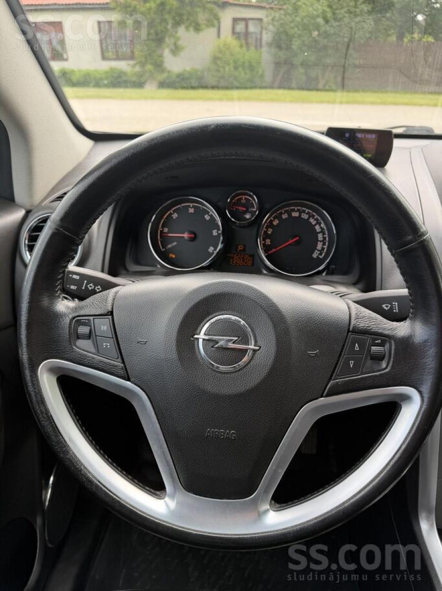 Black Opel Antara 2012 in Ventspils, with an engine capacity of 2.20 L and mileage of 140 thousand km for 5990 €, photo 12 on AUTOMOTO.COM.LV