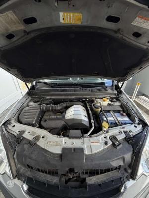 Grey Opel Antara 2009 in Vilnius, with an engine capacity of 1.99 L and mileage of 186 thousand km for 2950 €, photo 24 on AUTOMOTO.COM.LV
