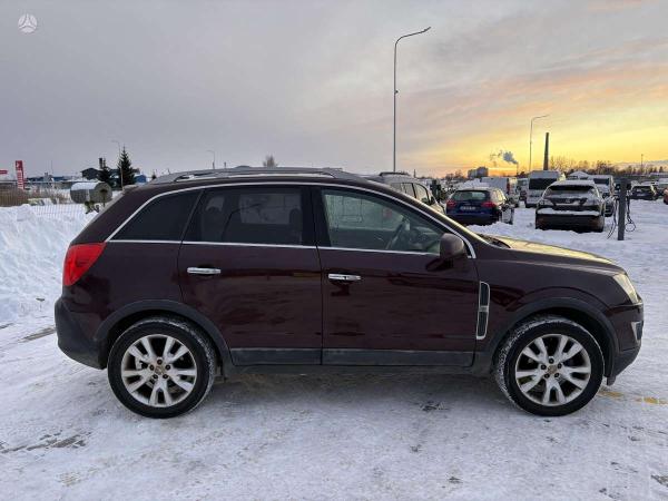 Red Opel Antara 2014 in Taurage, with an engine capacity of 2.23 L and mileage of 197 thousand km for 5000 €, photo 4 on AUTOMOTO.COM.LV