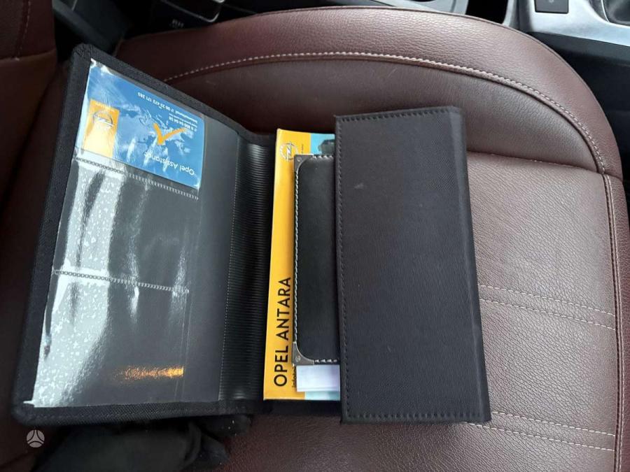 Red Opel Antara 2014 in Taurage, with an engine capacity of 2.23 L and mileage of 197 thousand km for 5000 €, photo 23 on AUTOMOTO.COM.LV