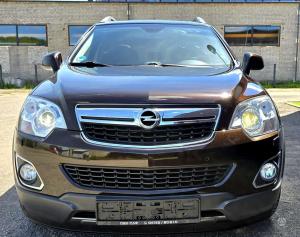 Red Opel Antara 2014 in Kretinga, with an engine capacity of 2.23 L and mileage of 184 thousand km for 6150 €, photo 3 on AUTOMOTO.COM.LV