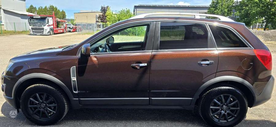 Red Opel Antara 2014 in Kretinga, with an engine capacity of 2.23 L and mileage of 184 thousand km for 6150 €, photo 9 on AUTOMOTO.COM.LV