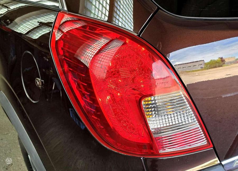 Red Opel Antara 2014 in Kretinga, with an engine capacity of 2.23 L and mileage of 184 thousand km for 6150 €, photo 13 on AUTOMOTO.COM.LV