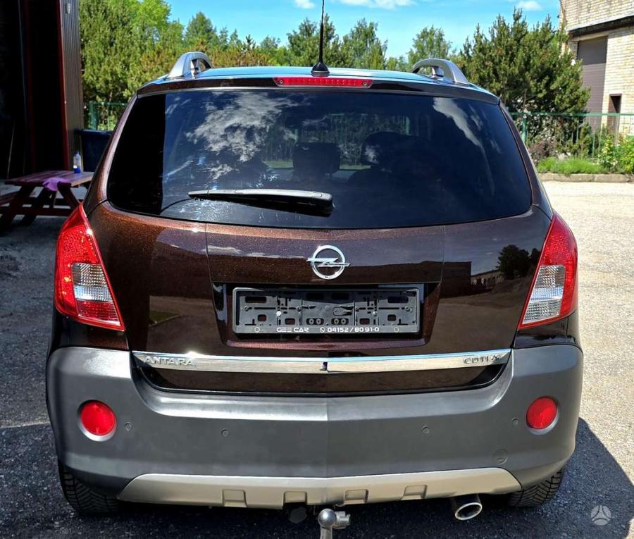 Red Opel Antara 2014 in Kretinga, with an engine capacity of 2.23 L and mileage of 184 thousand km for 6150 €, photo 14 on AUTOMOTO.COM.LV