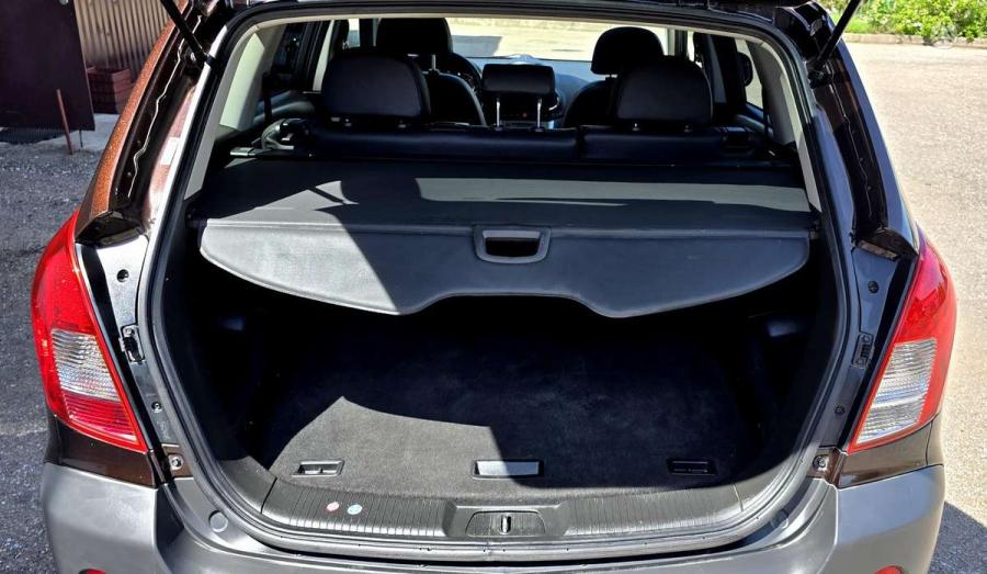 Red Opel Antara 2014 in Kretinga, with an engine capacity of 2.23 L and mileage of 184 thousand km for 6150 €, photo 15 on AUTOMOTO.COM.LV
