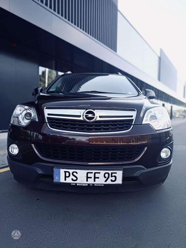 Red Opel Antara 2015 in Utena, with an engine capacity of 2.23 L and mileage of 226 thousand km for 7950 €, photo 1 on AUTOMOTO.COM.LV