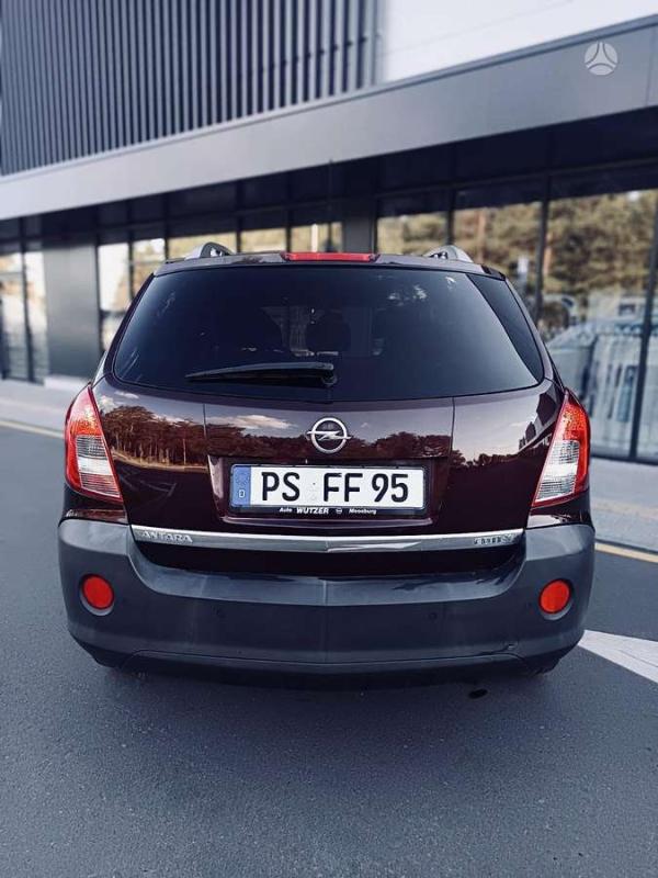 Red Opel Antara 2015 in Utena, with an engine capacity of 2.23 L and mileage of 226 thousand km for 7950 €, photo 2 on AUTOMOTO.COM.LV