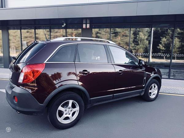 Red Opel Antara 2015 in Utena, with an engine capacity of 2.23 L and mileage of 226 thousand km for 7950 €, photo 8 on AUTOMOTO.COM.LV
