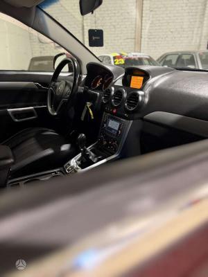 Red Opel Antara 2015 in Klaipeda, with an engine capacity of 2.23 L and mileage of 195 thousand km for 6999 €, photo 14 on AUTOMOTO.COM.LV