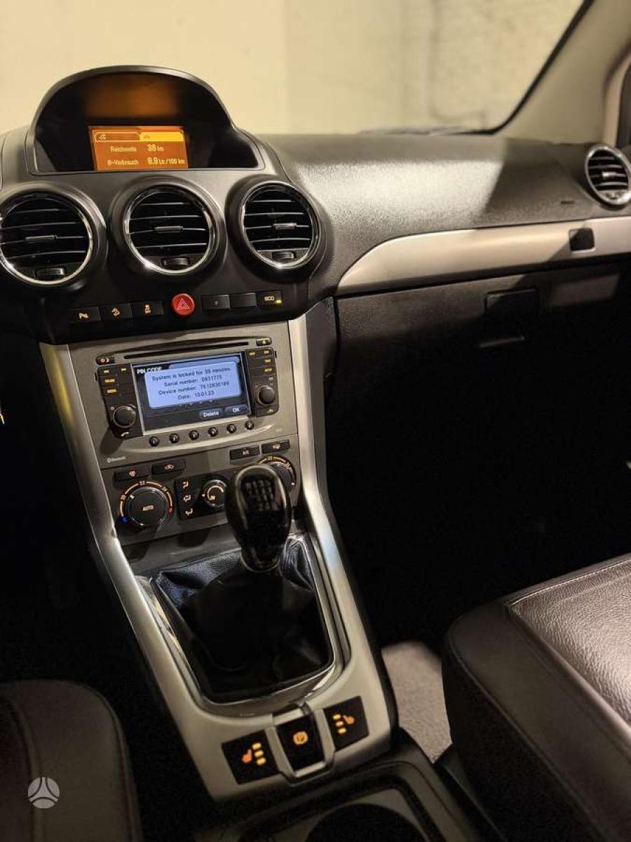 Red Opel Antara 2015 in Klaipeda, with an engine capacity of 2.23 L and mileage of 195 thousand km for 6999 €, photo 16 on AUTOMOTO.COM.LV