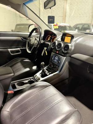 Red Opel Antara 2015 in Klaipeda, with an engine capacity of 2.23 L and mileage of 195 thousand km for 6999 €, photo 18 on AUTOMOTO.COM.LV