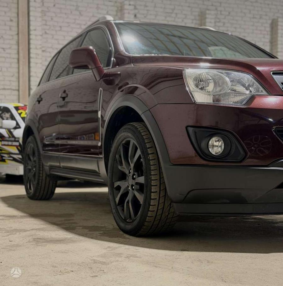 Red Opel Antara 2015 in Klaipeda, with an engine capacity of 2.23 L and mileage of 195 thousand km for 6999 €, photo 19 on AUTOMOTO.COM.LV