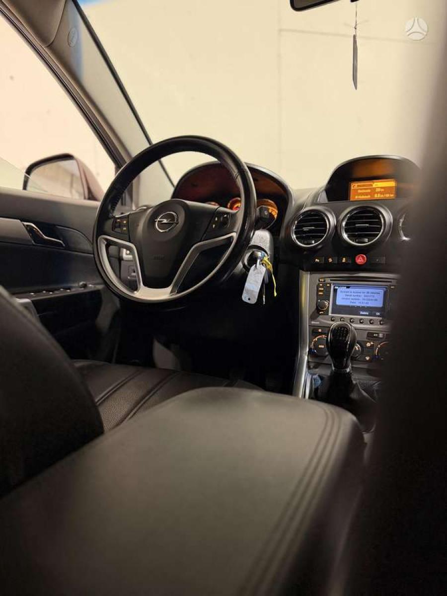 Red Opel Antara 2015 in Klaipeda, with an engine capacity of 2.23 L and mileage of 195 thousand km for 6999 €, photo 28 on AUTOMOTO.COM.LV