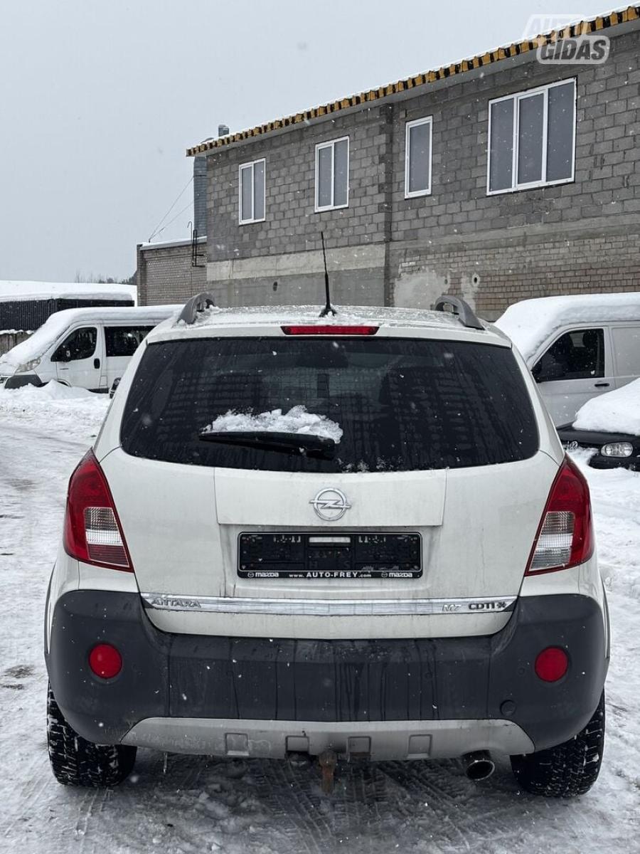White Opel Antara 2012 in Utena, with an engine capacity of 2.20 L and mileage of 298 thousand km for 4750 €, photo 4 on AUTOMOTO.COM.LV