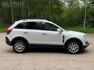 White Opel Antara 2012 in Riga, with an engine capacity of 2.20 L and mileage of 0 thousand km for 4599 €, photo 7 on AUTOMOTO.COM.LV