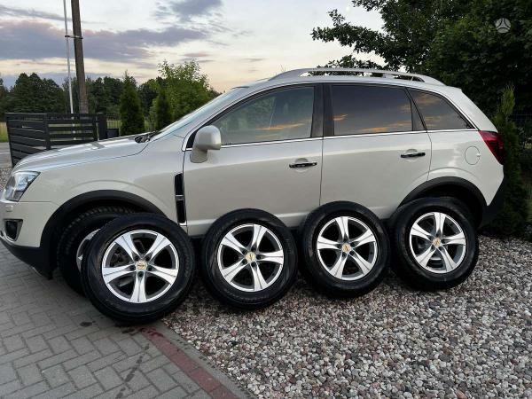 White Opel Antara 2013 in Druskininkai, with an engine capacity of 2.23 L and mileage of 248 thousand km for 5890 €, photo 4 on AUTOMOTO.COM.LV