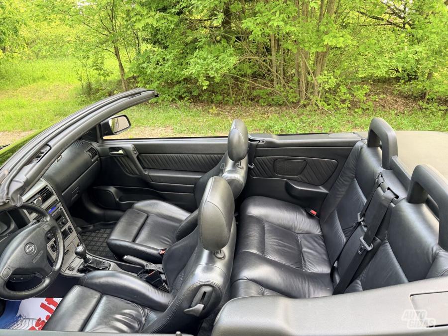 Black Opel Astra 2002 in Utena, with an engine capacity of 2.20 L and mileage of 287 thousand km for 1950 €, photo 21 on AUTOMOTO.COM.LV